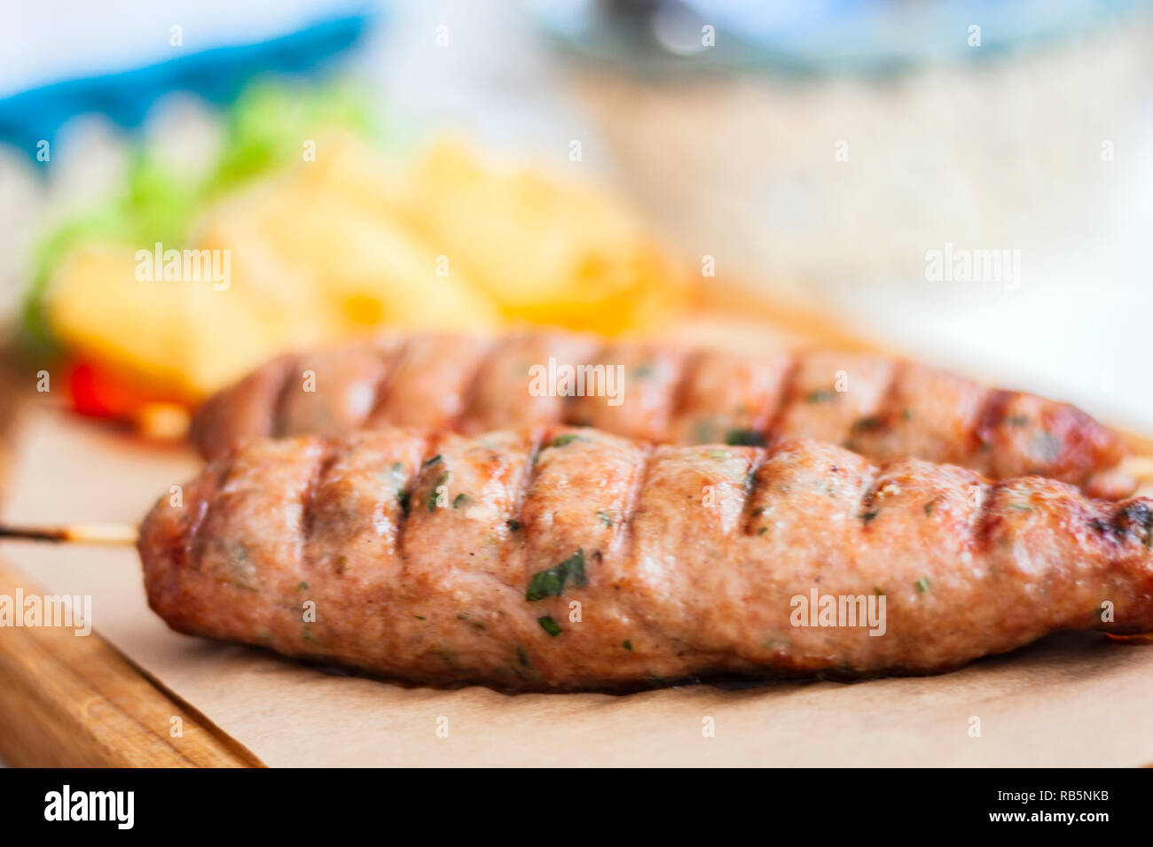 Fried minced meat - traditional Greek lunch on a blue plate in a ...