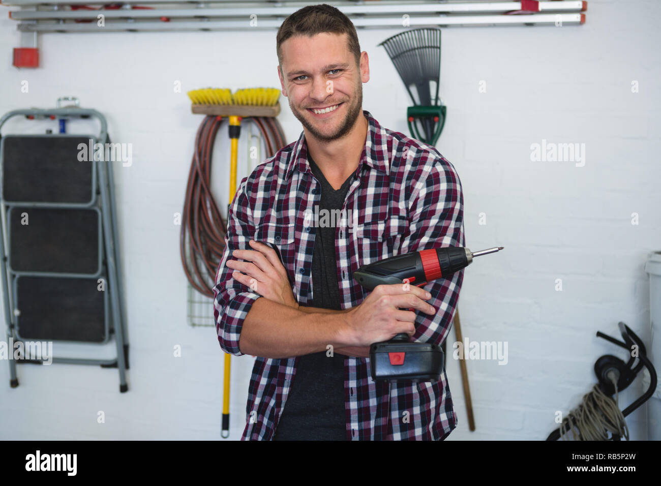 Happy carpenter man arms hi-res stock photography and images - Alamy