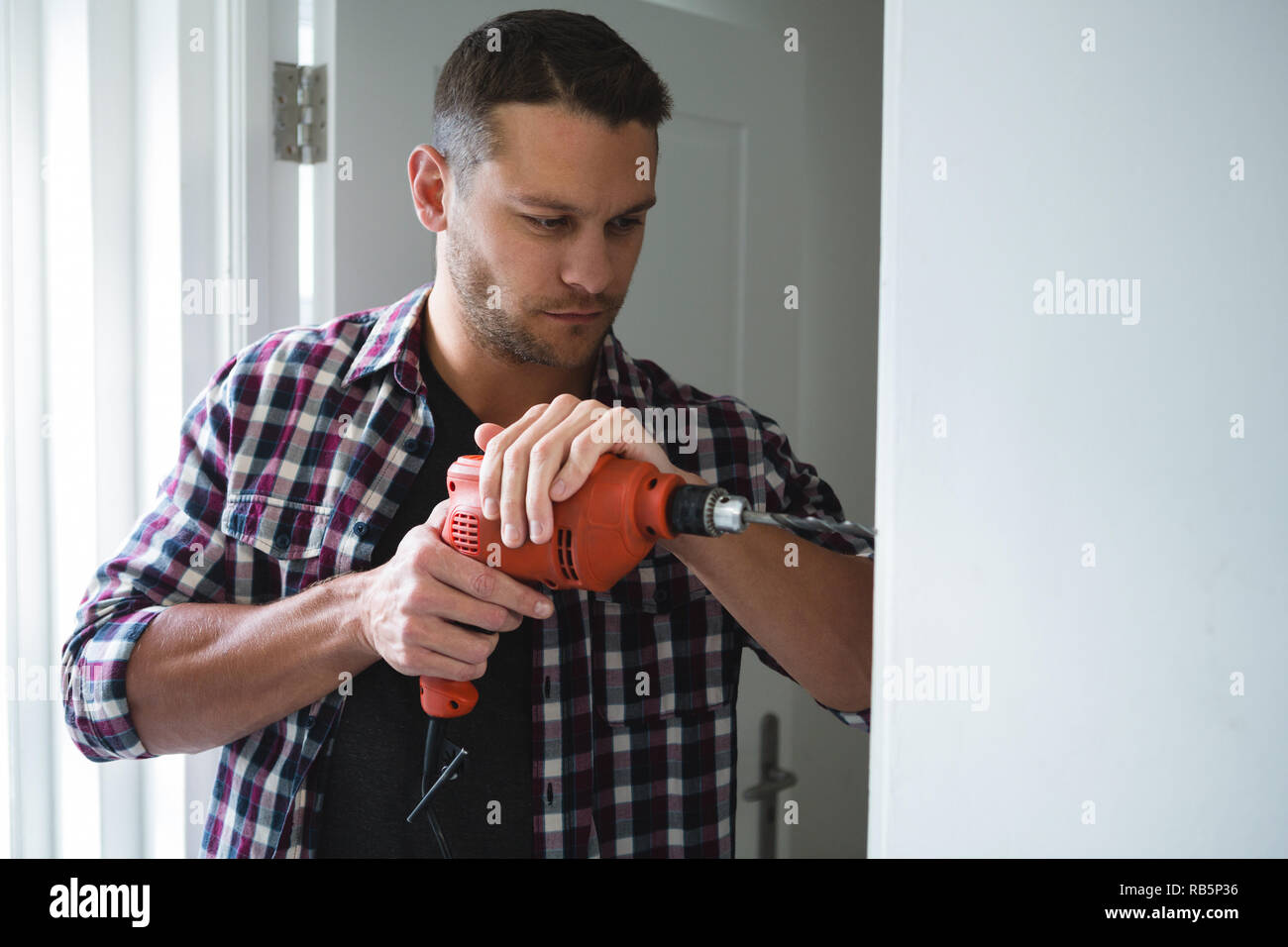 Hand drill machine hi-res stock photography and images - Alamy