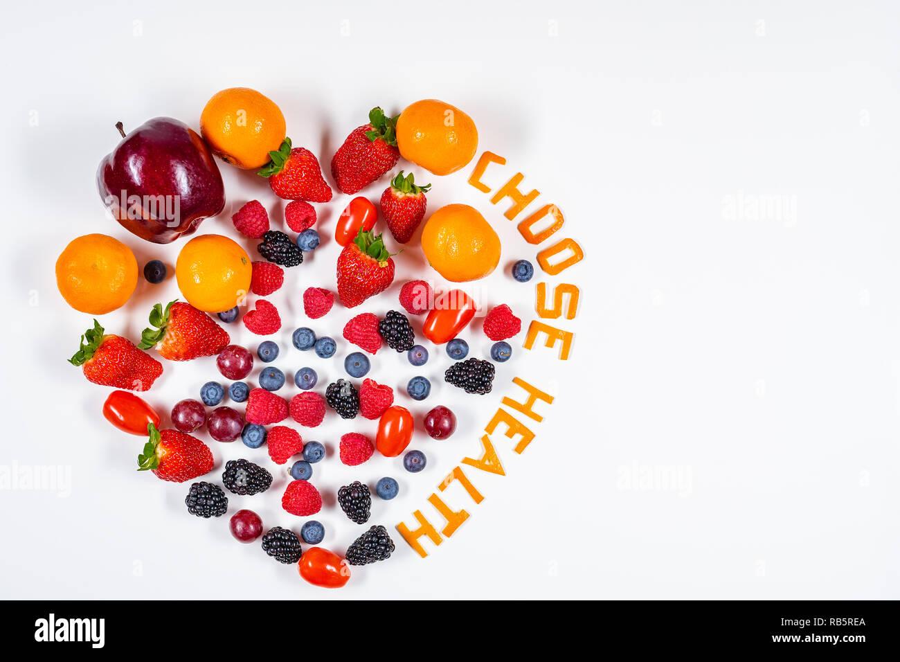 Heart shaped fruits arrangement with Choose Health message made out of ...
