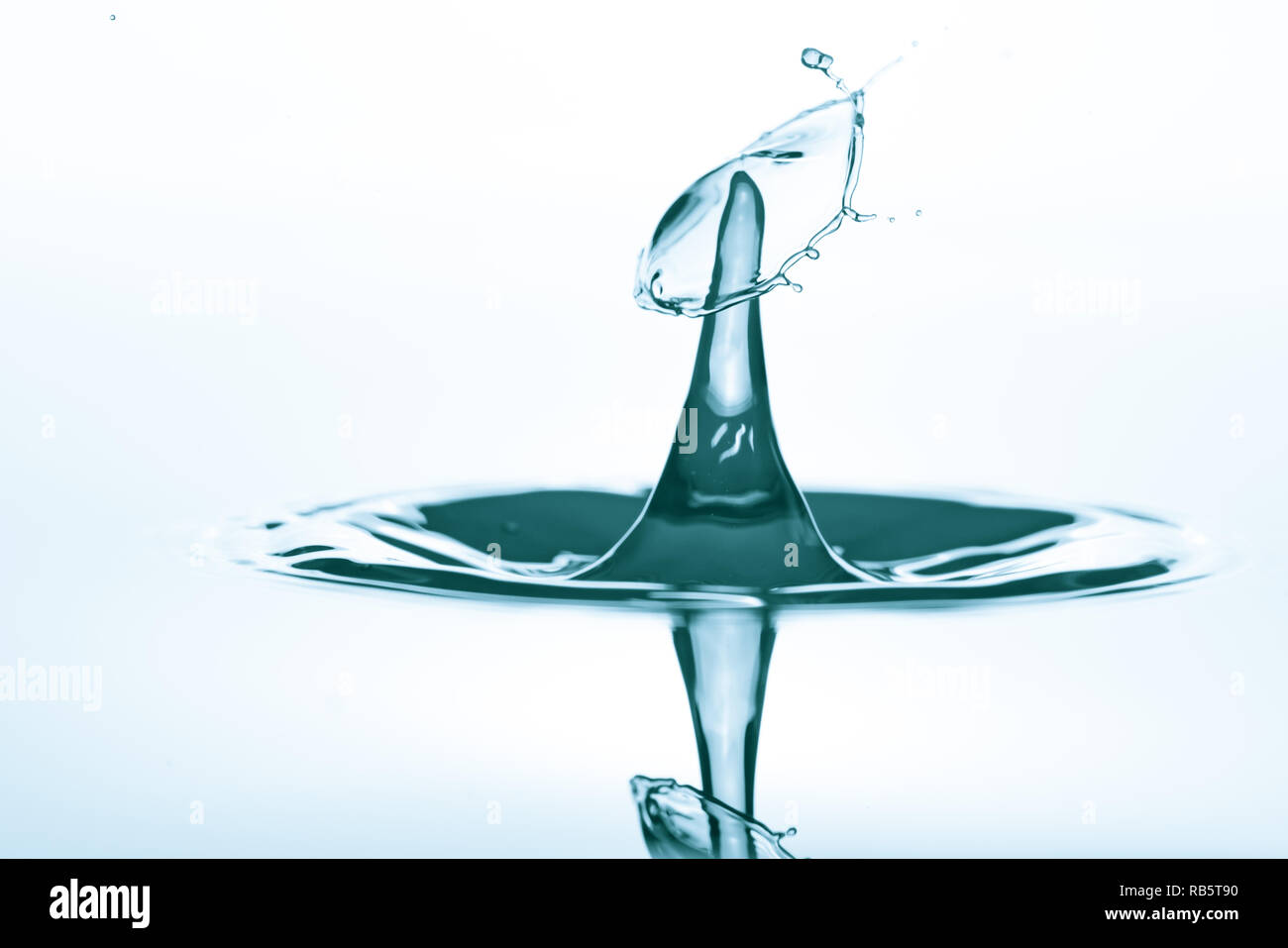 splash of the falling drops of water, collision drops Stock Photo - Alamy