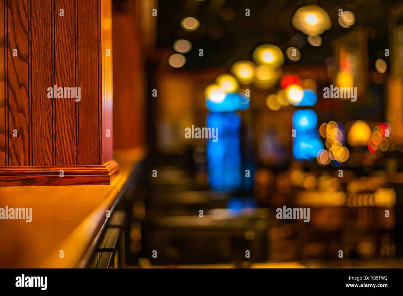 Wooden column dividing the bar? restaurant area with blurred out ...