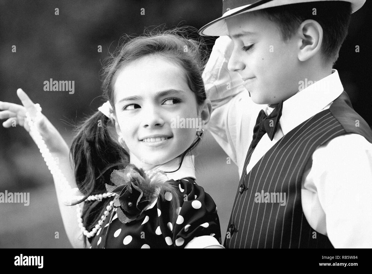 Portrait of a very young couple in retro garment. More images with the ...