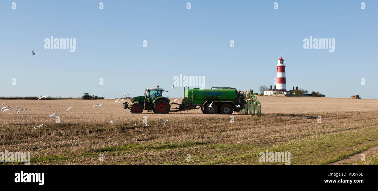 Slurry being injected into a stubble field on a coastal farm Stock ...