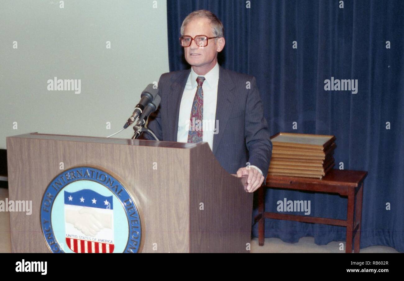 End World Hunger - Speaking at the podium Stock Photo - Alamy