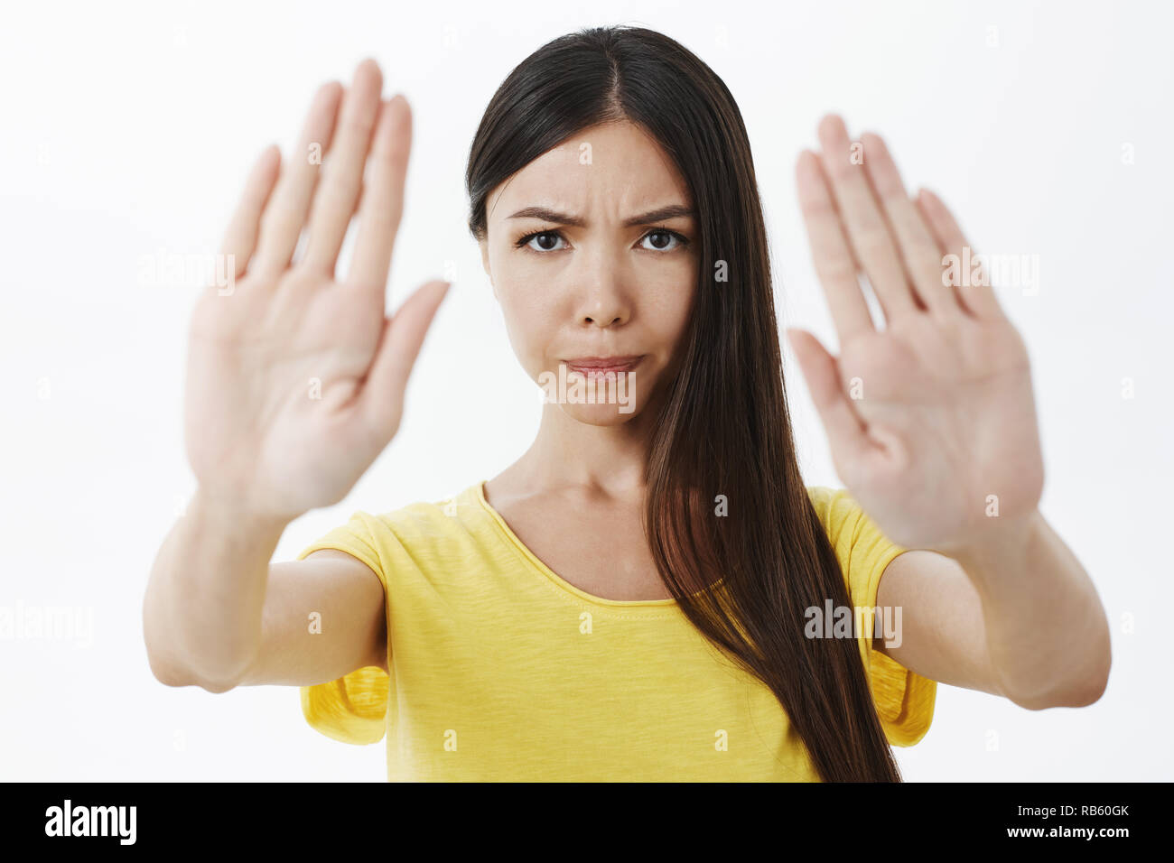 Enough of cosmetological products. Displeased intense serious-looking ...