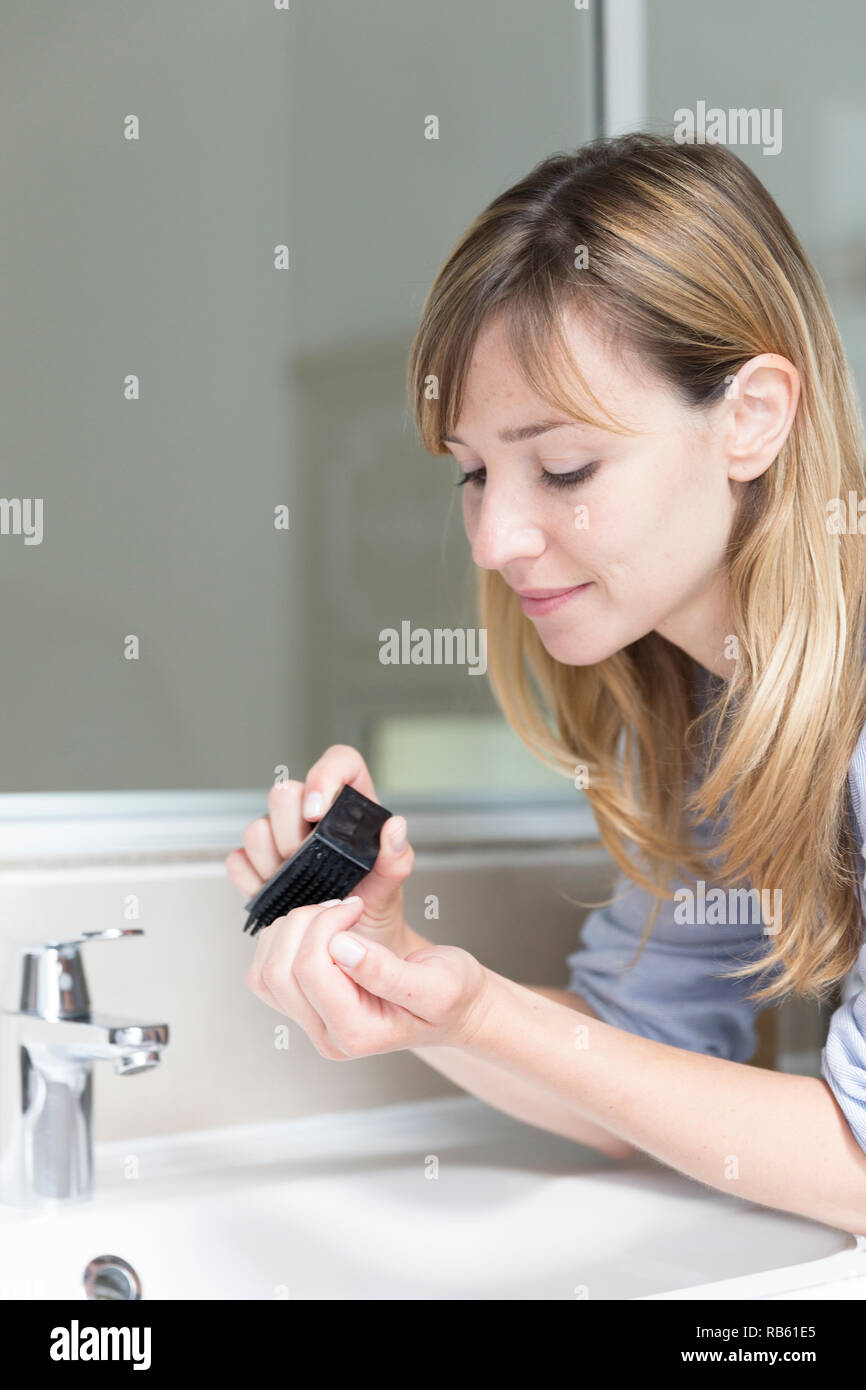 Woman nails cleaning hi-res stock photography and images - Alamy