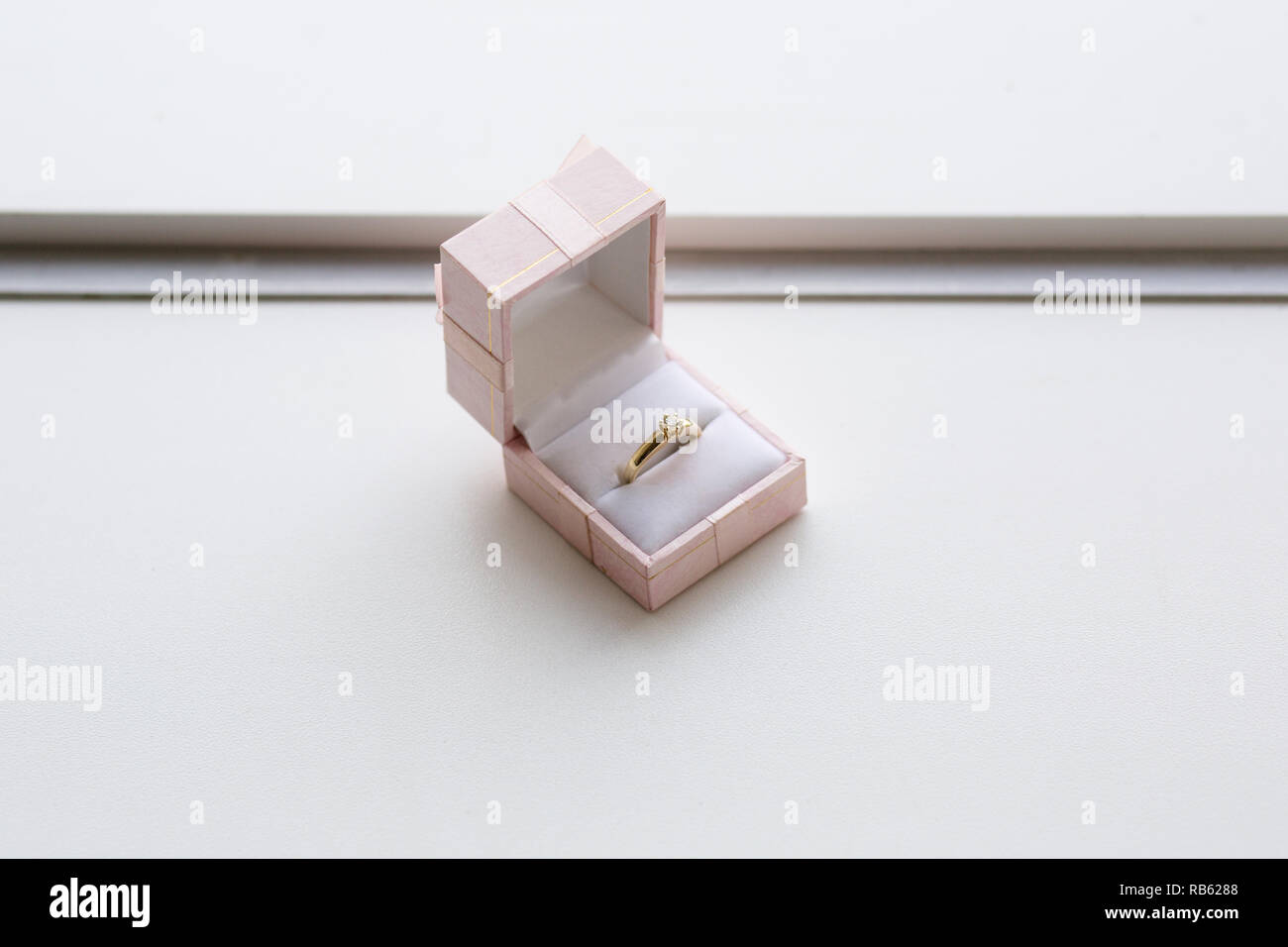 Gold ring box hi-res stock photography and images - Alamy