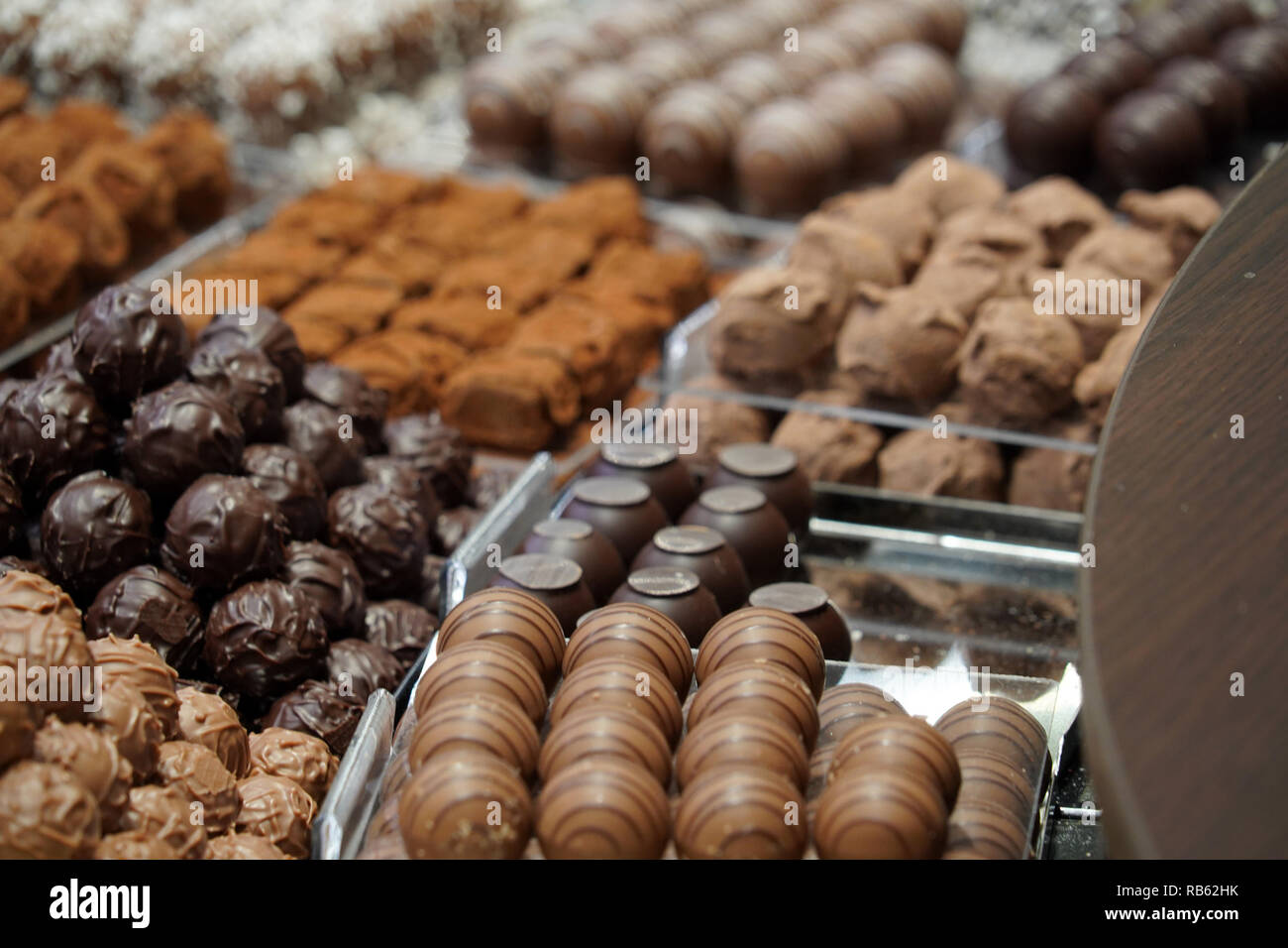 swiss chocolate candy on display Stock Photo - Alamy