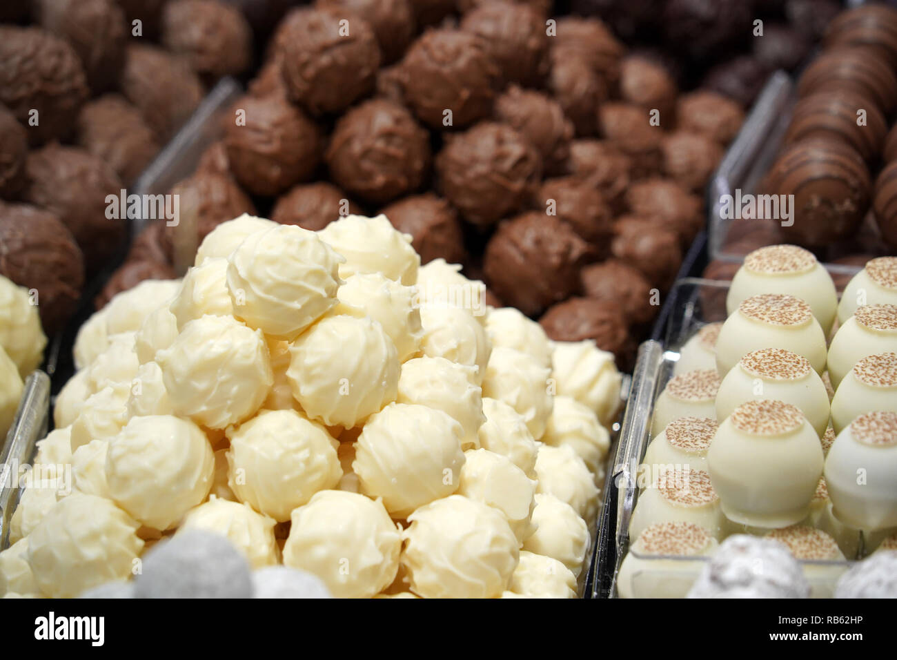 swiss chocolate candy on display Stock Photo - Alamy