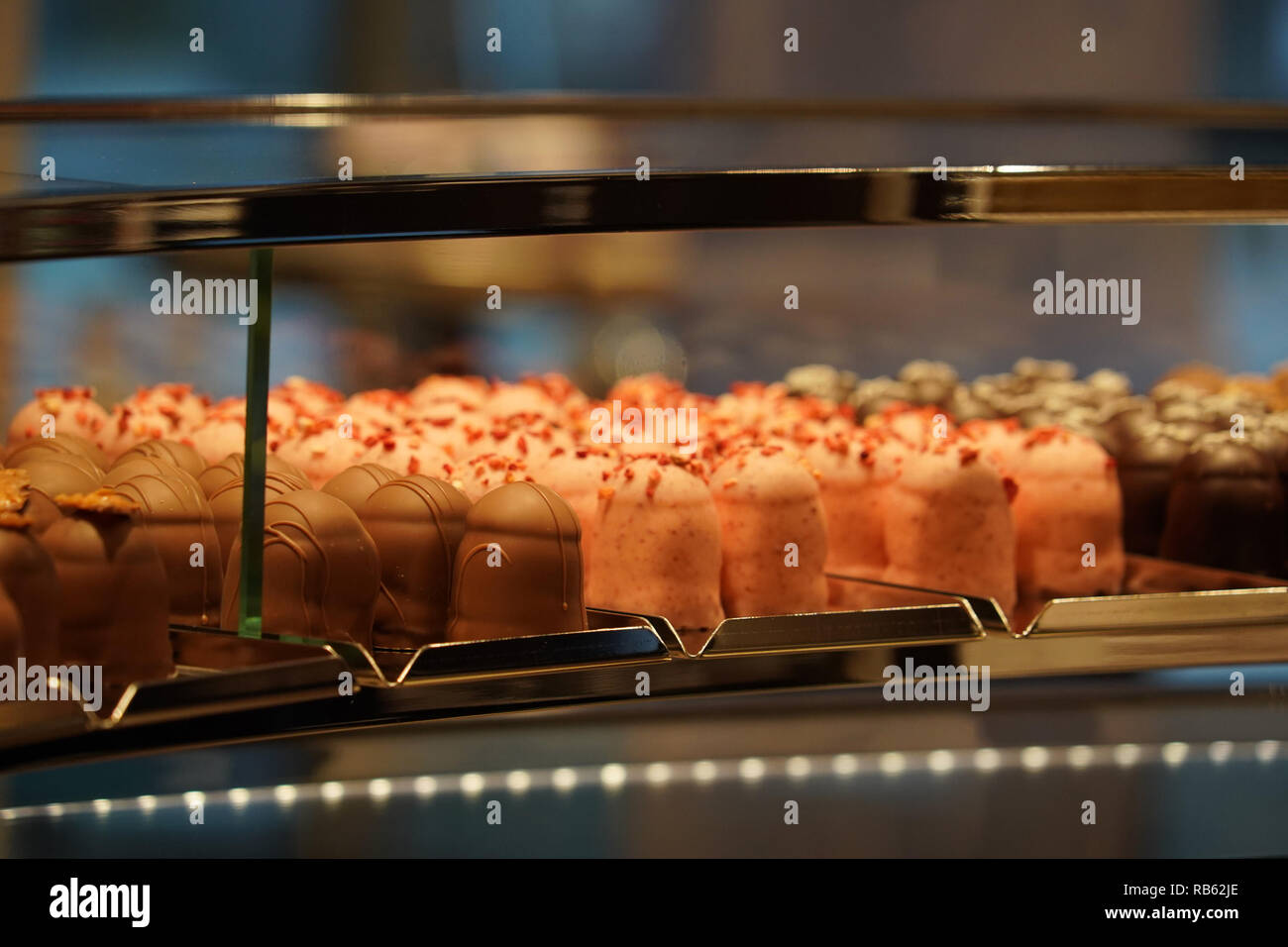 swiss chocolate candy on display Stock Photo - Alamy