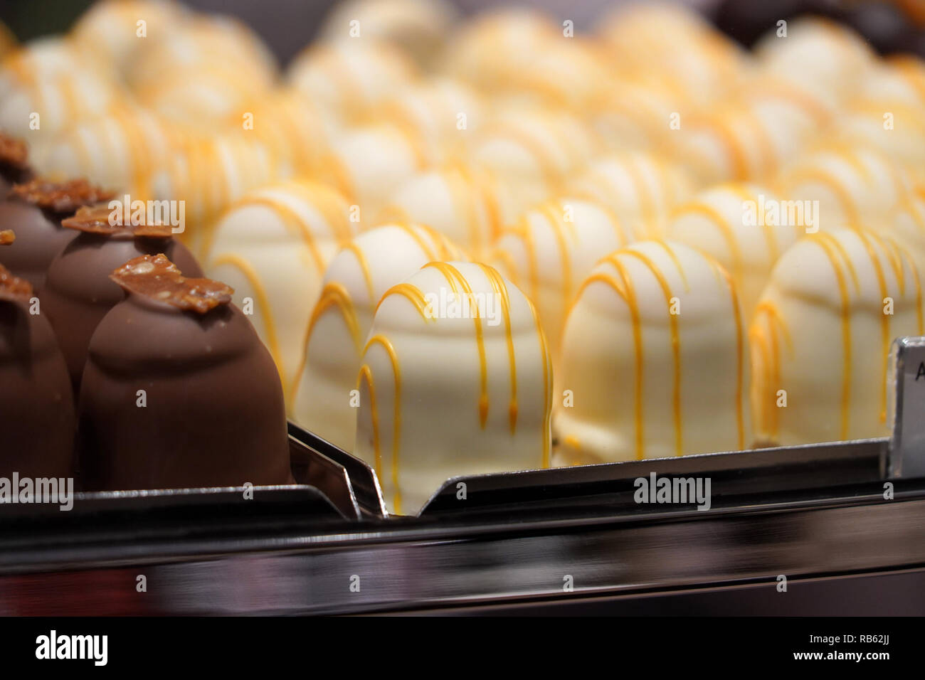 swiss chocolate candy on display Stock Photo - Alamy