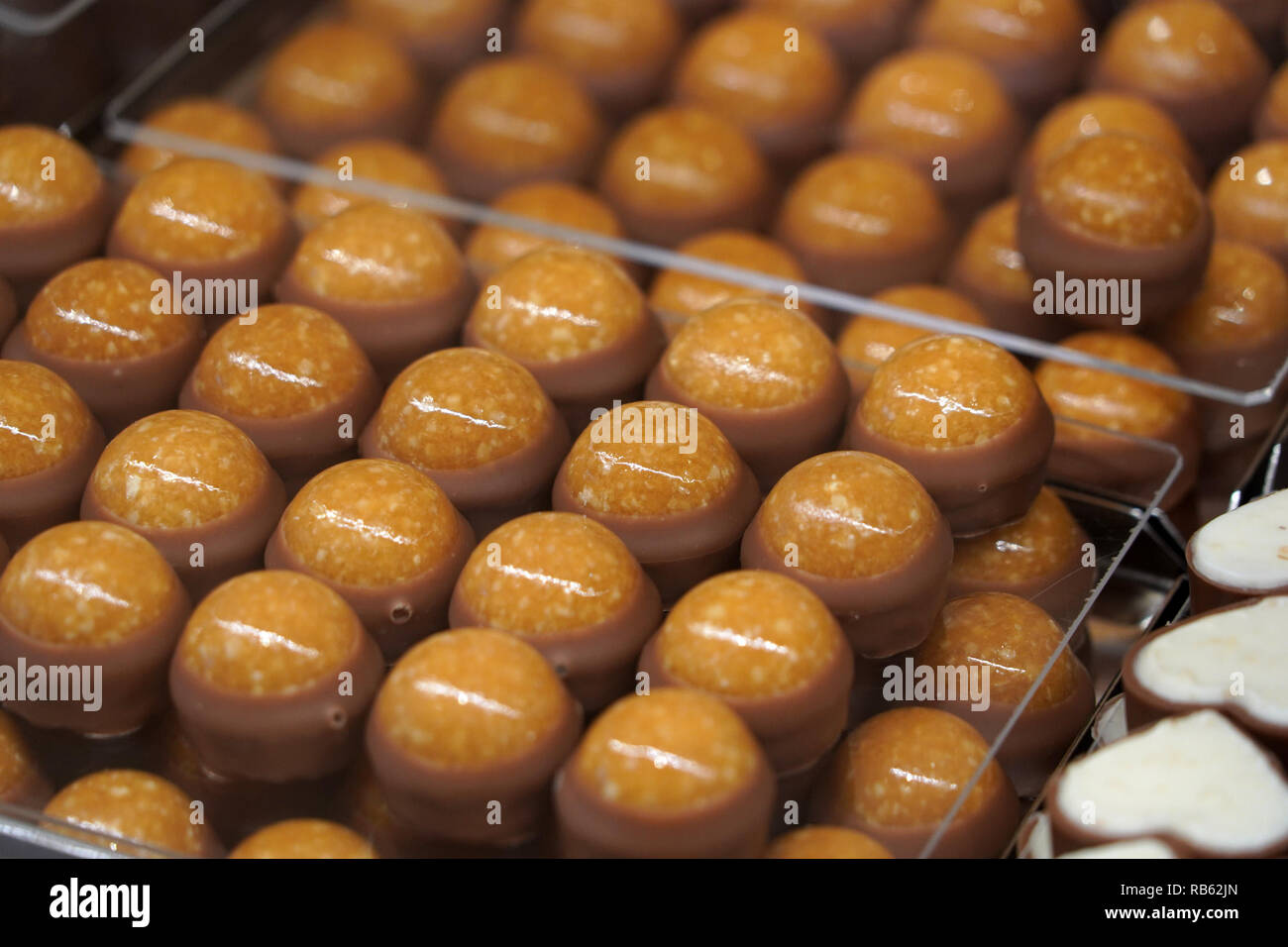 swiss chocolate candy on display Stock Photo - Alamy