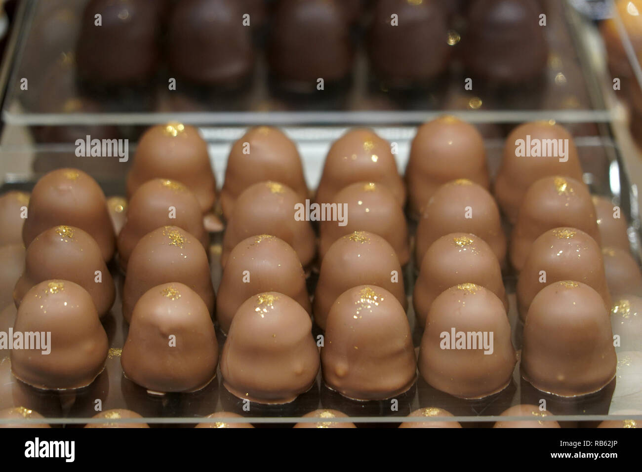 swiss chocolate candy on display Stock Photo - Alamy