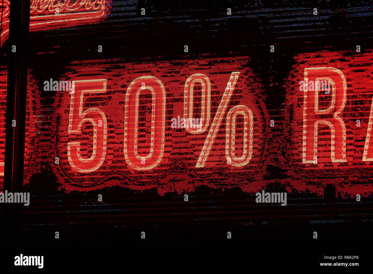 50 percent neon sign on black Stock Photo - Alamy