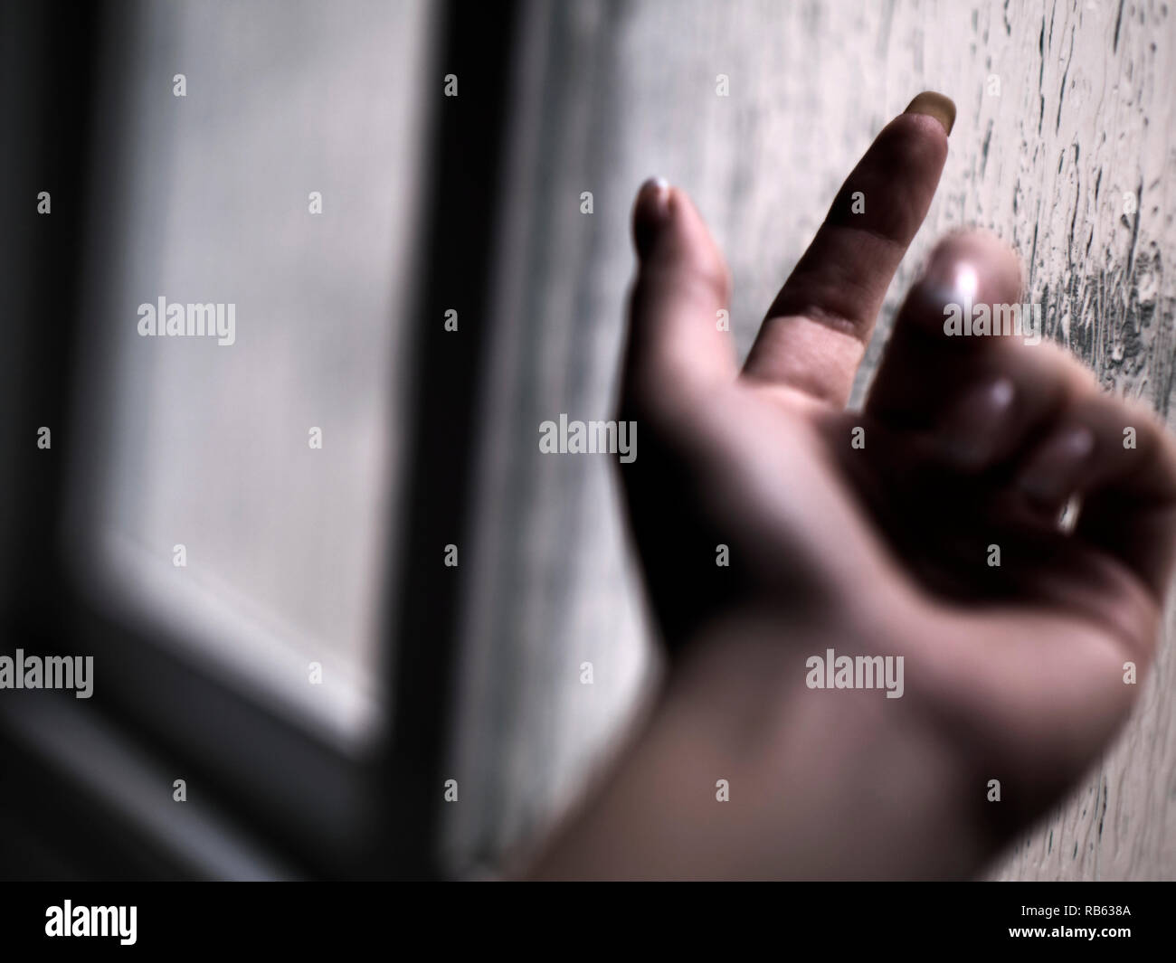 Woman doing come hither motion with hand Stock Photo - Alamy