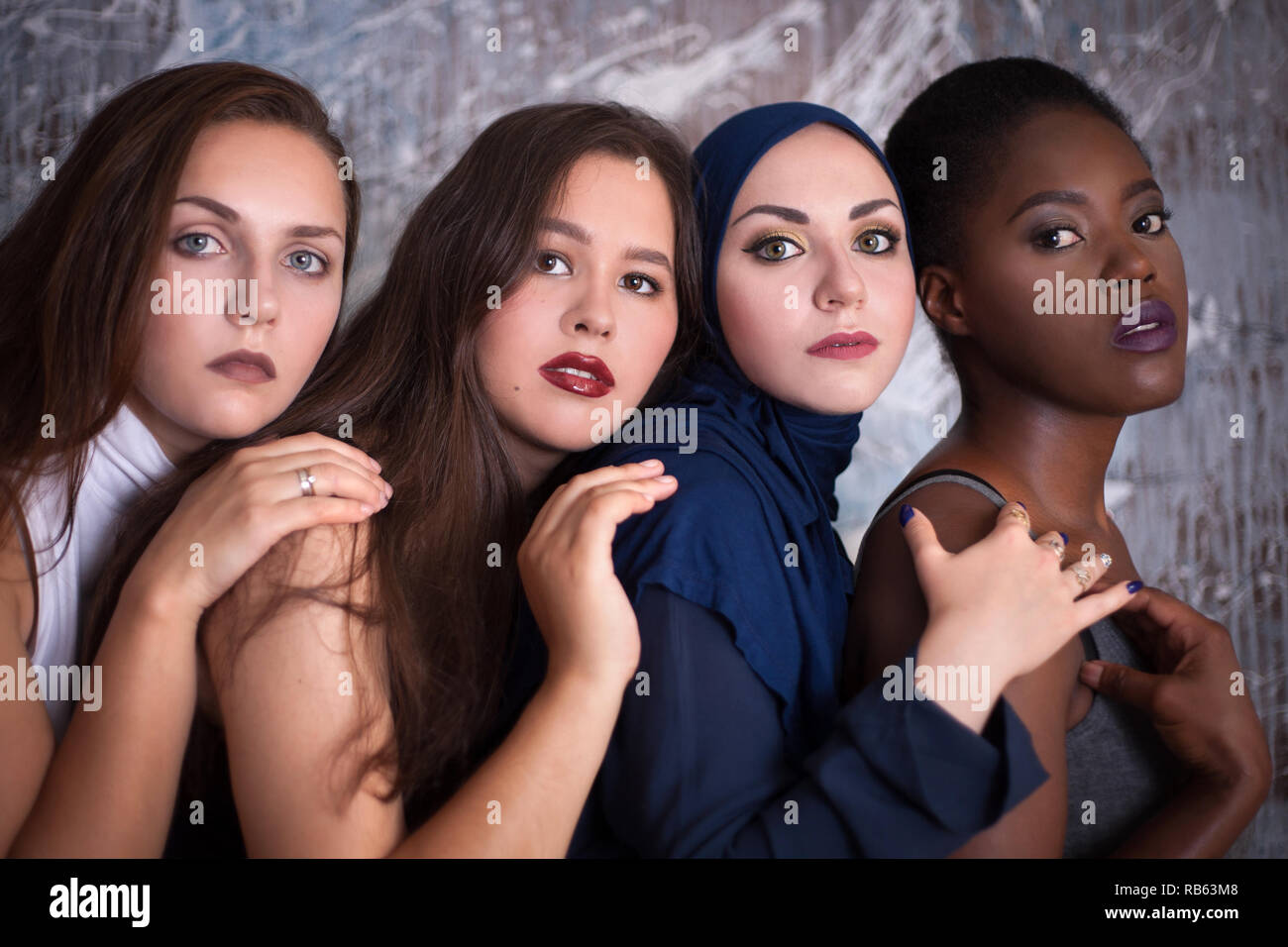 Portrait of four girls with different skin color and nationality in the ...