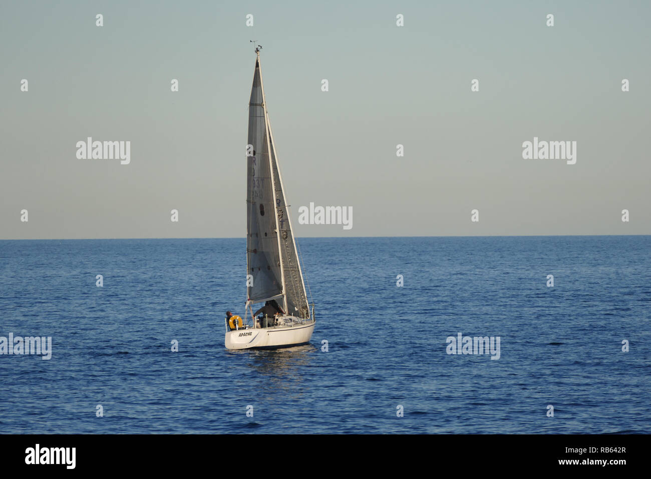 yacht sailing on a calm sea Stock Photo - Alamy
