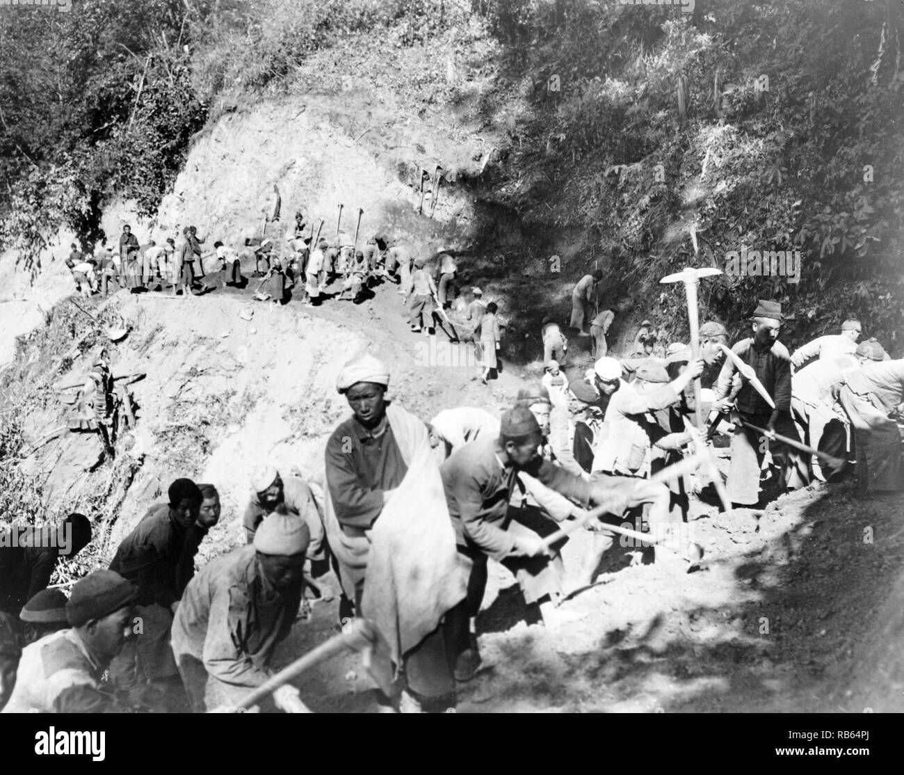 Photograph of Chinese labourers working to reopen the Burma Road in ...