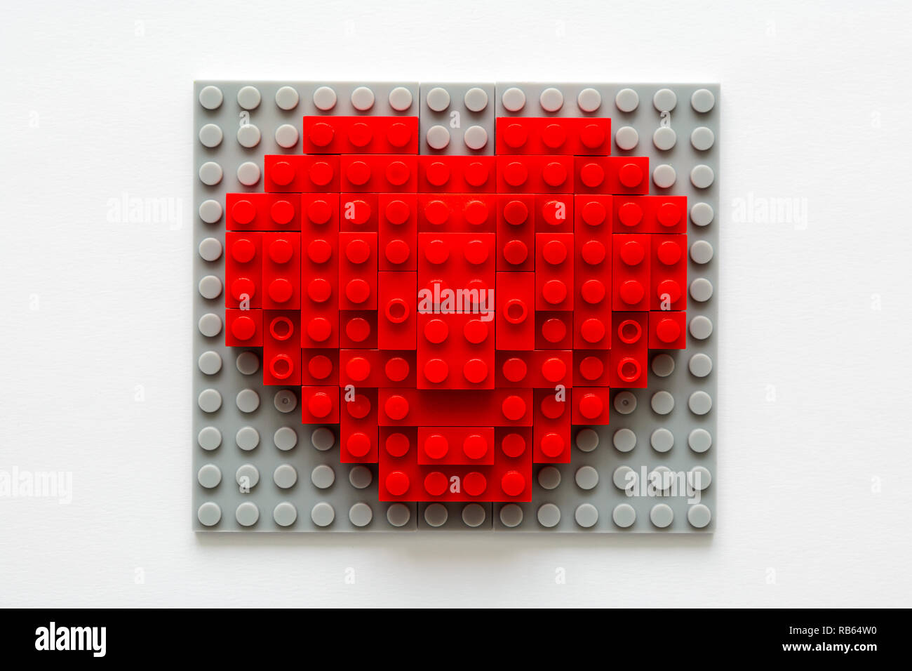 Red heart made from building blocks on gray background. Valentines day ...