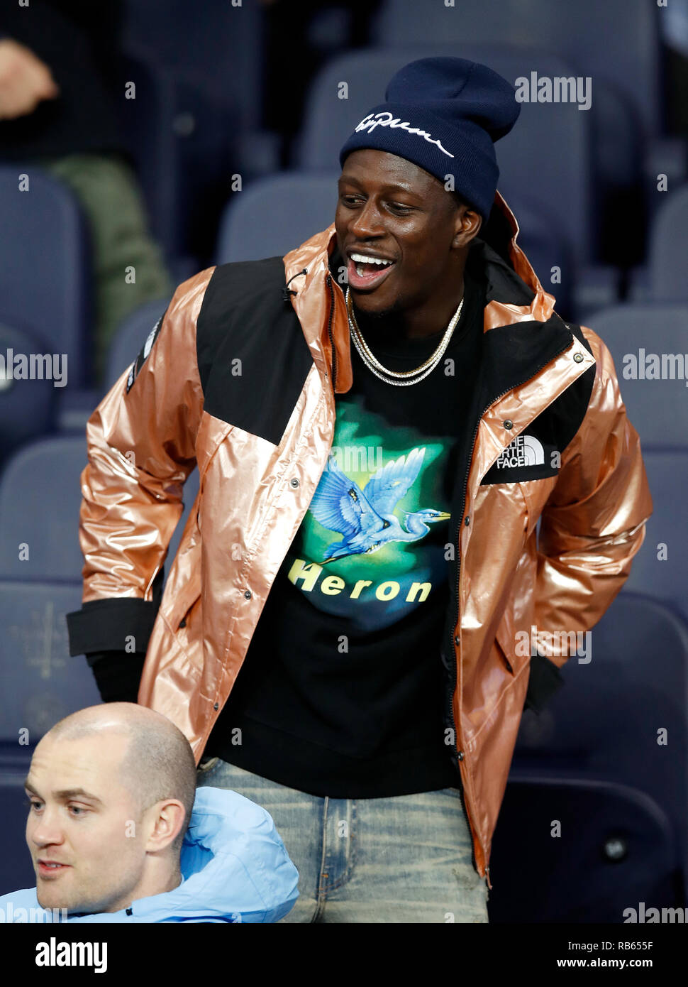 Manchester City's Benjamin Mendy in the stands Stock Photo - Alamy