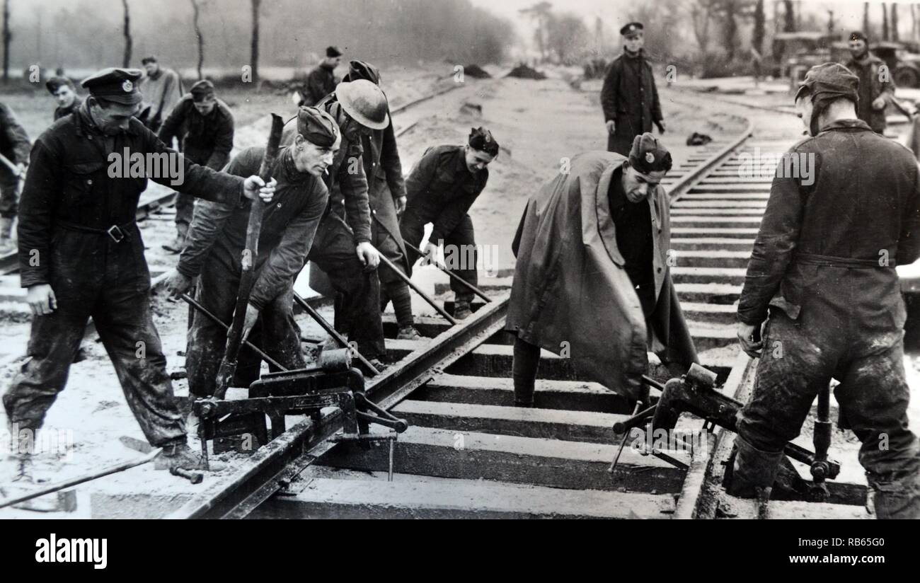World War Two: British soldiers fix railway tracks in northern France ...