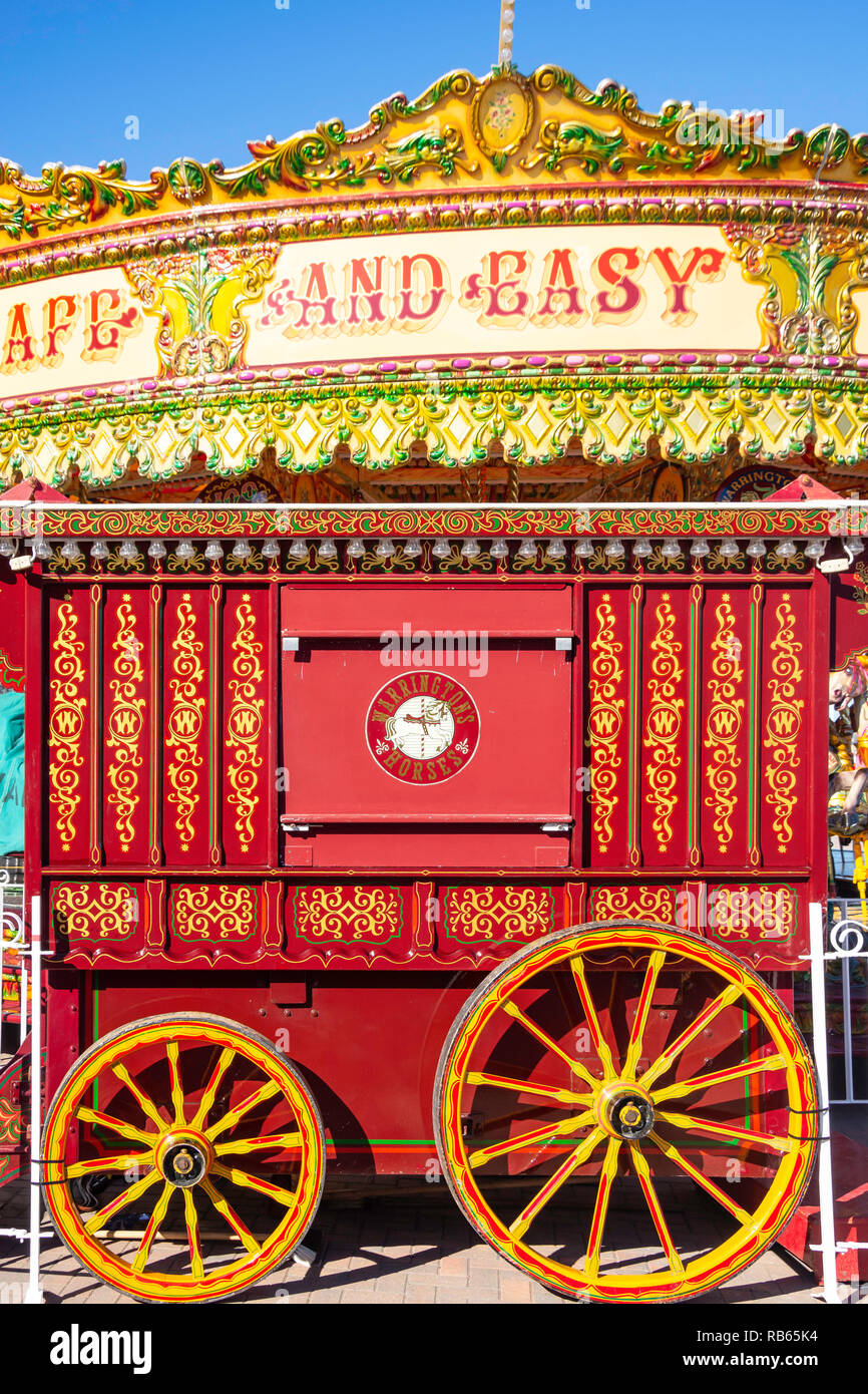 Galloper merry go round roundabout childrens carousel on beach hi-res ...