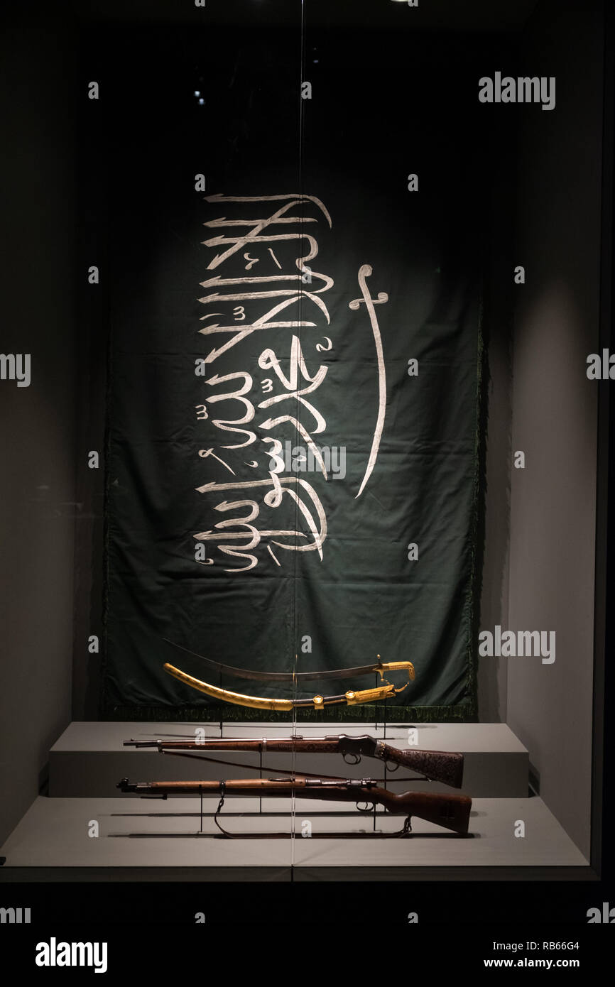 Flag of Saudi Arabia and Rifles showing a sabre (a symbol of victory ...