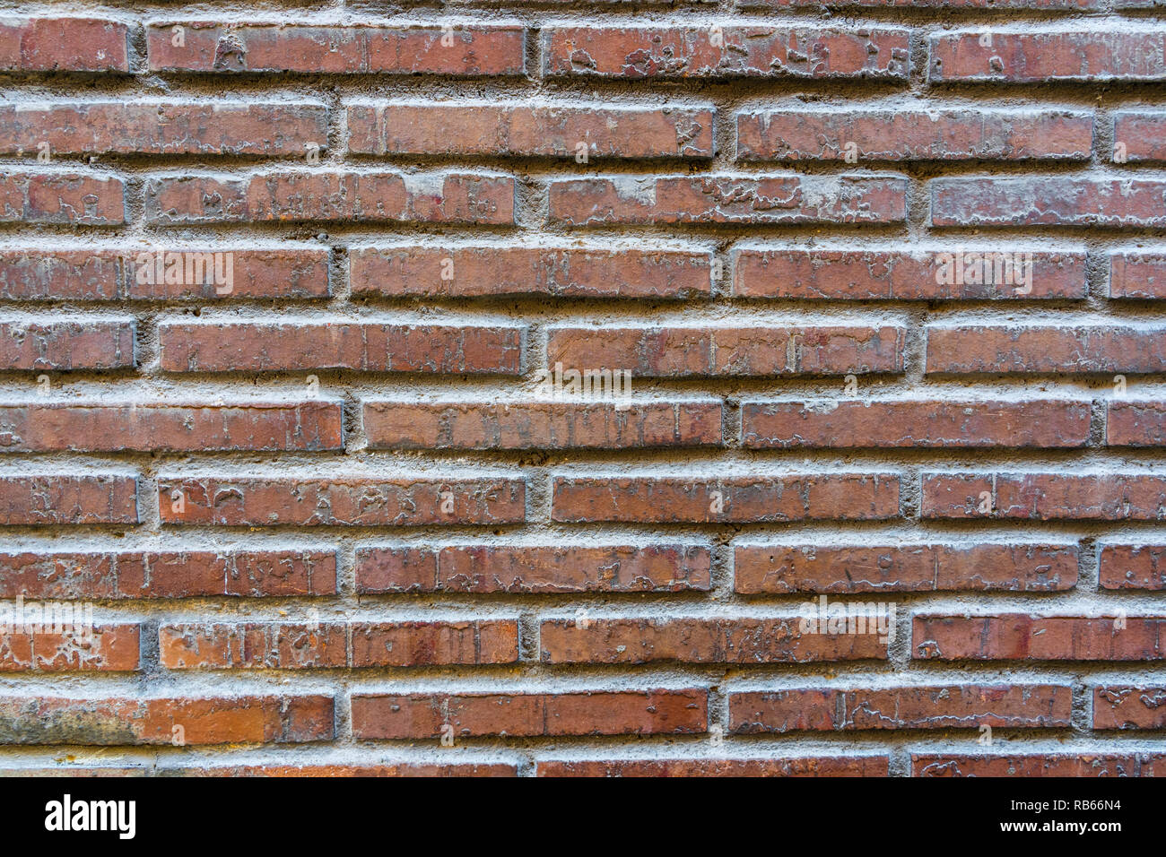 Red Brick wall. Mediterranean style. Aged wall. Concrete and bricks ...