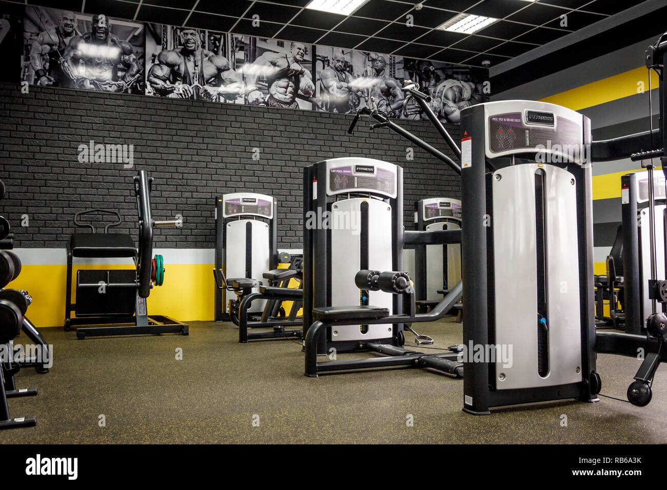 empty gym for fitness and bodybuilding with fitness equipment and ...