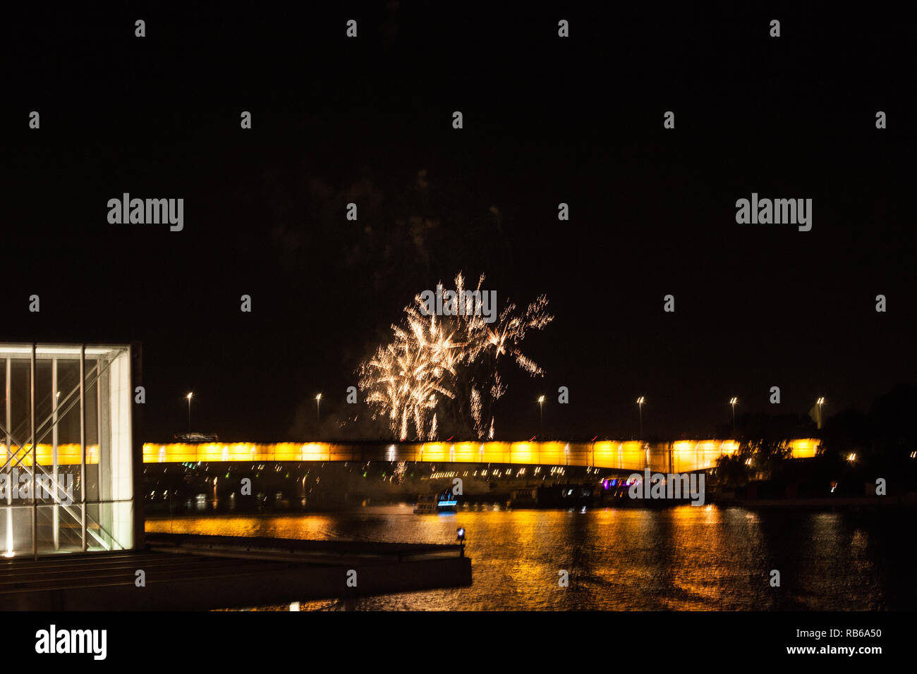 Fireworks over bridge on night sky Stock Photo - Alamy