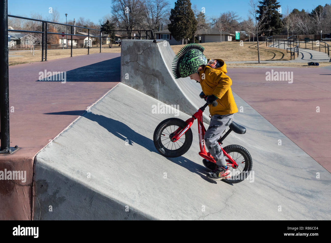 Denver, Colorado - Adam Hjermstad Jr., 4, rides his balance bike in a ...