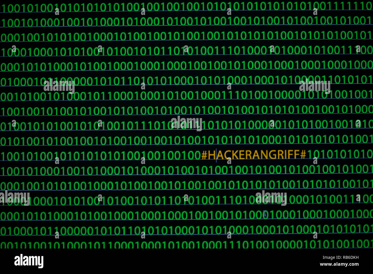 Schwerin, Germany. 04th Jan, 2019. Between the binary code on a laptop ...