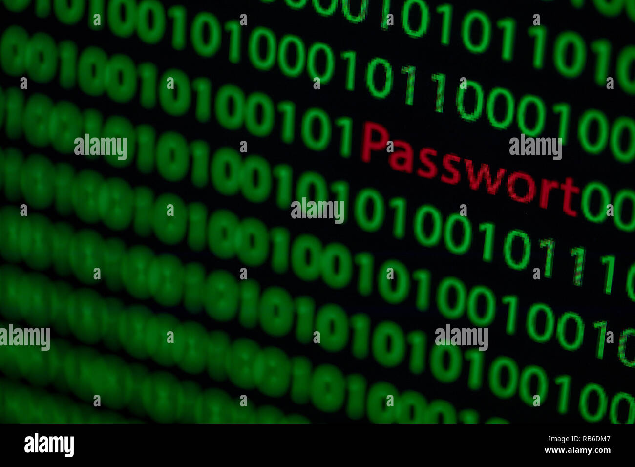 Schwerin, Germany. 04th Jan, 2019. Between the binary code on a laptop ...