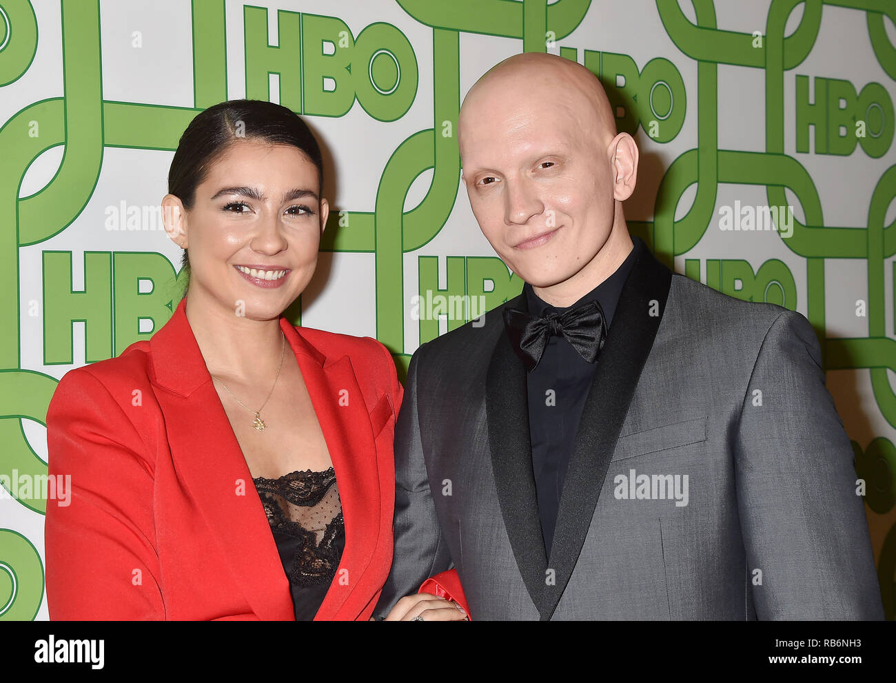 BEVERLY HILLS, CA - JANUARY 06: Anthony Carrigan (R) and Gia Carrigan ...