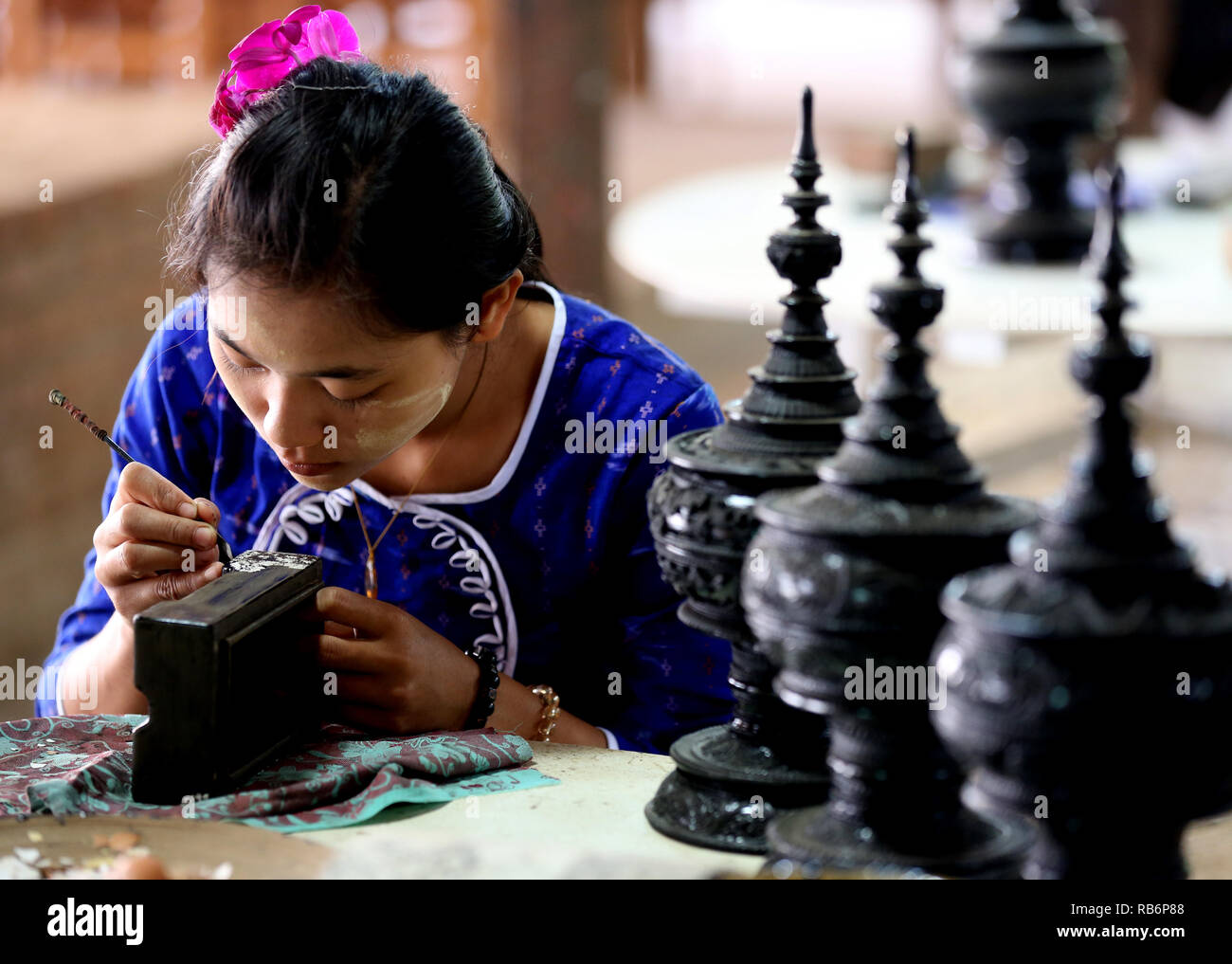 Bagan, Myanmar. 7th Jan, 2019. A worker makes lacquerware at a workshop ...