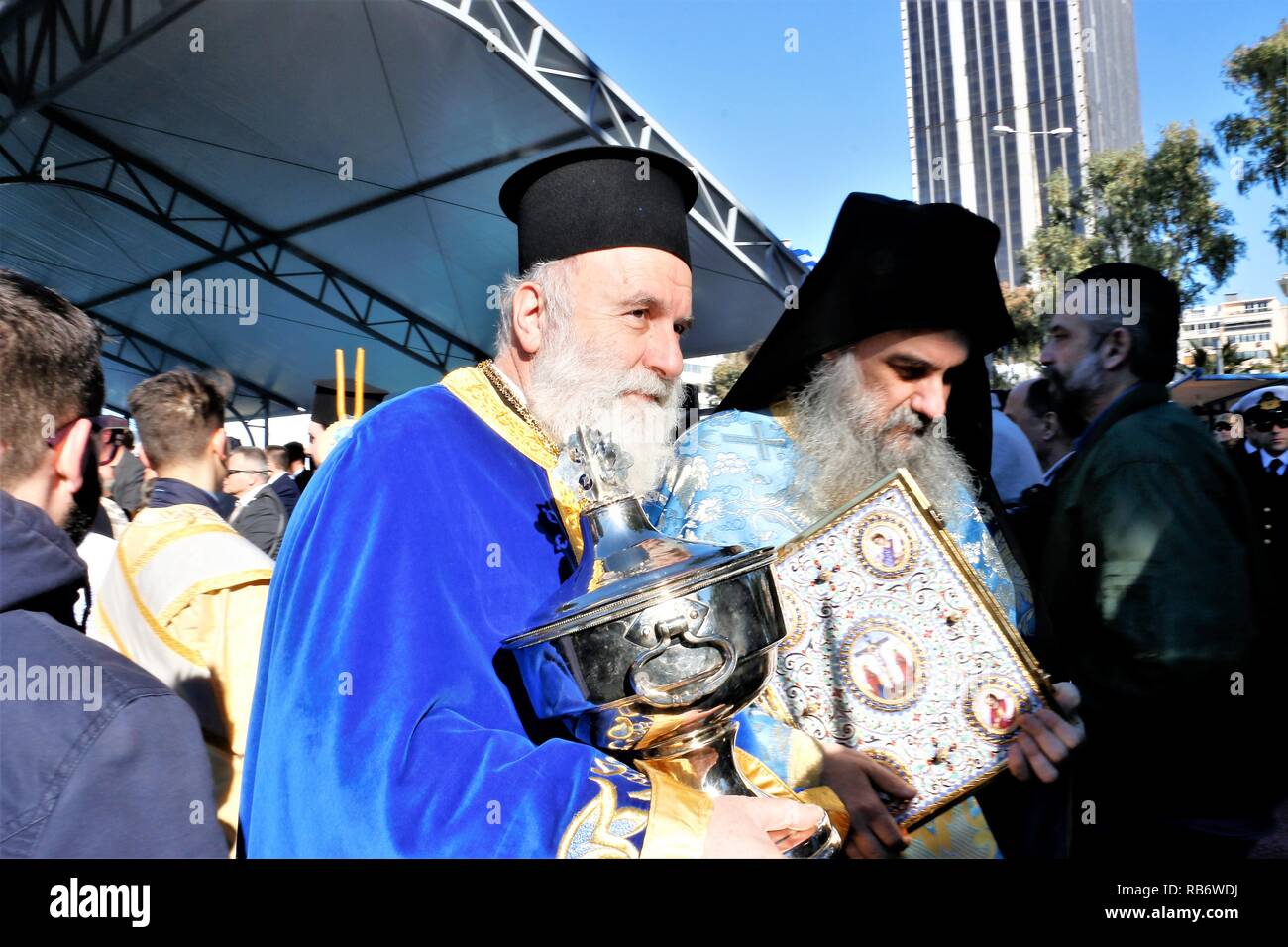 Orthodox priests are seen chanting holy words during the annual ...