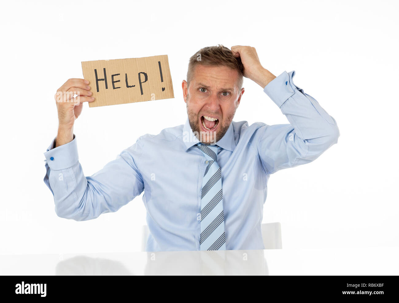 Young attractive frustrated and tired caucasian businessman holding ...