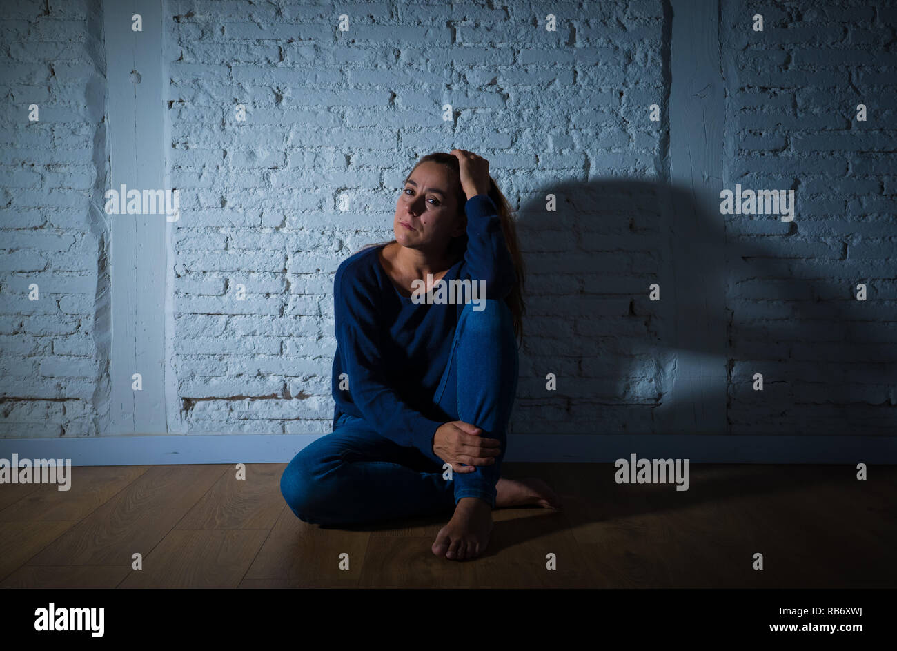 Young devastated depressed woman crying feeling hurt suffering ...