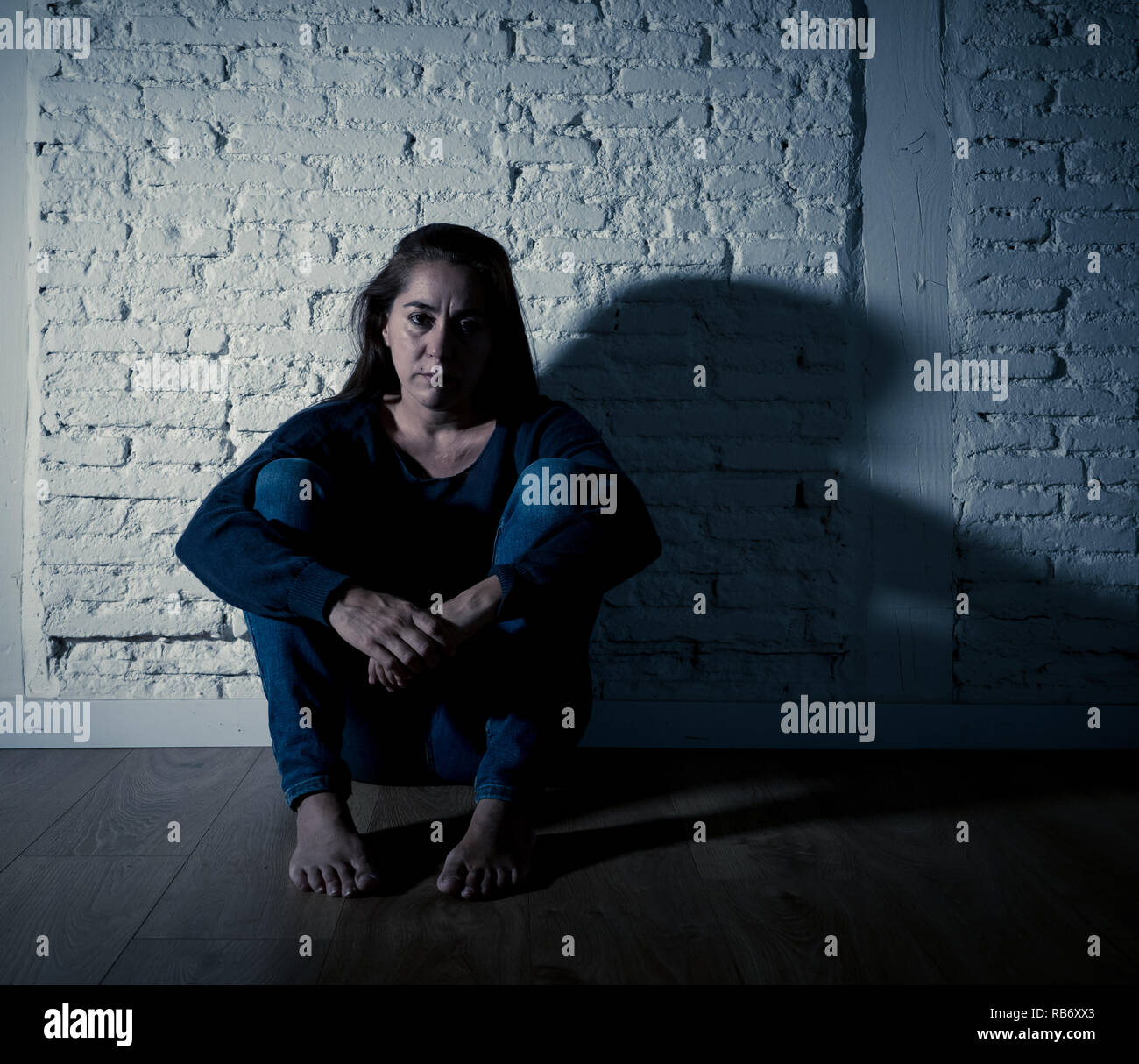 Young devastated depressed woman crying feeling hurt suffering ...