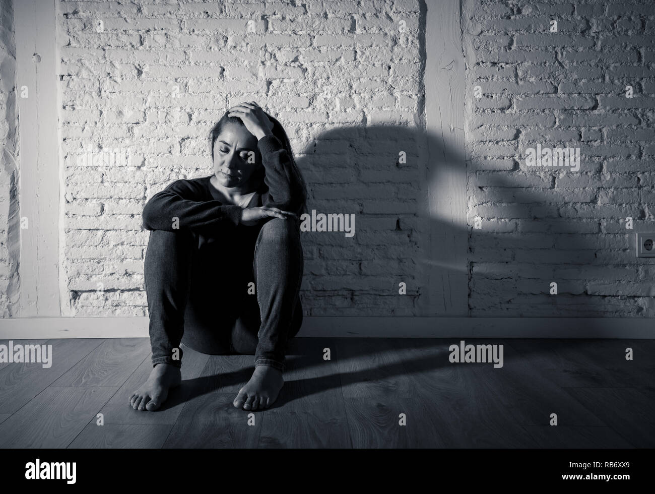 Young devastated depressed woman crying feeling hurt suffering ...