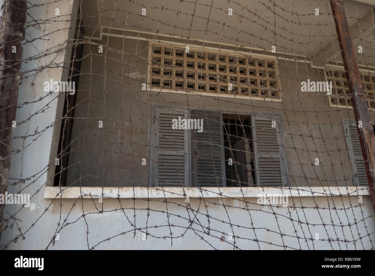 Cell-block C in the former Tuol Sleng Prison, aka S-21, originally a ...