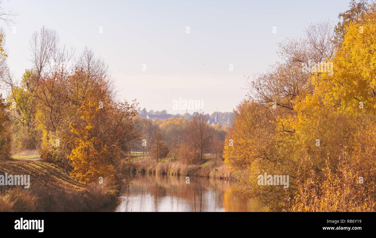 Color outdoor fall nature image of a rural autumnal misty river scene ...