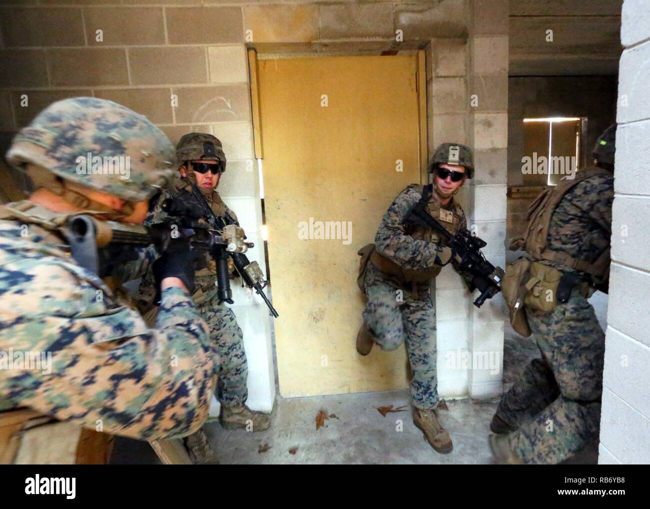 Marines practice clearing rooms in the Urban Assault Course during a ...