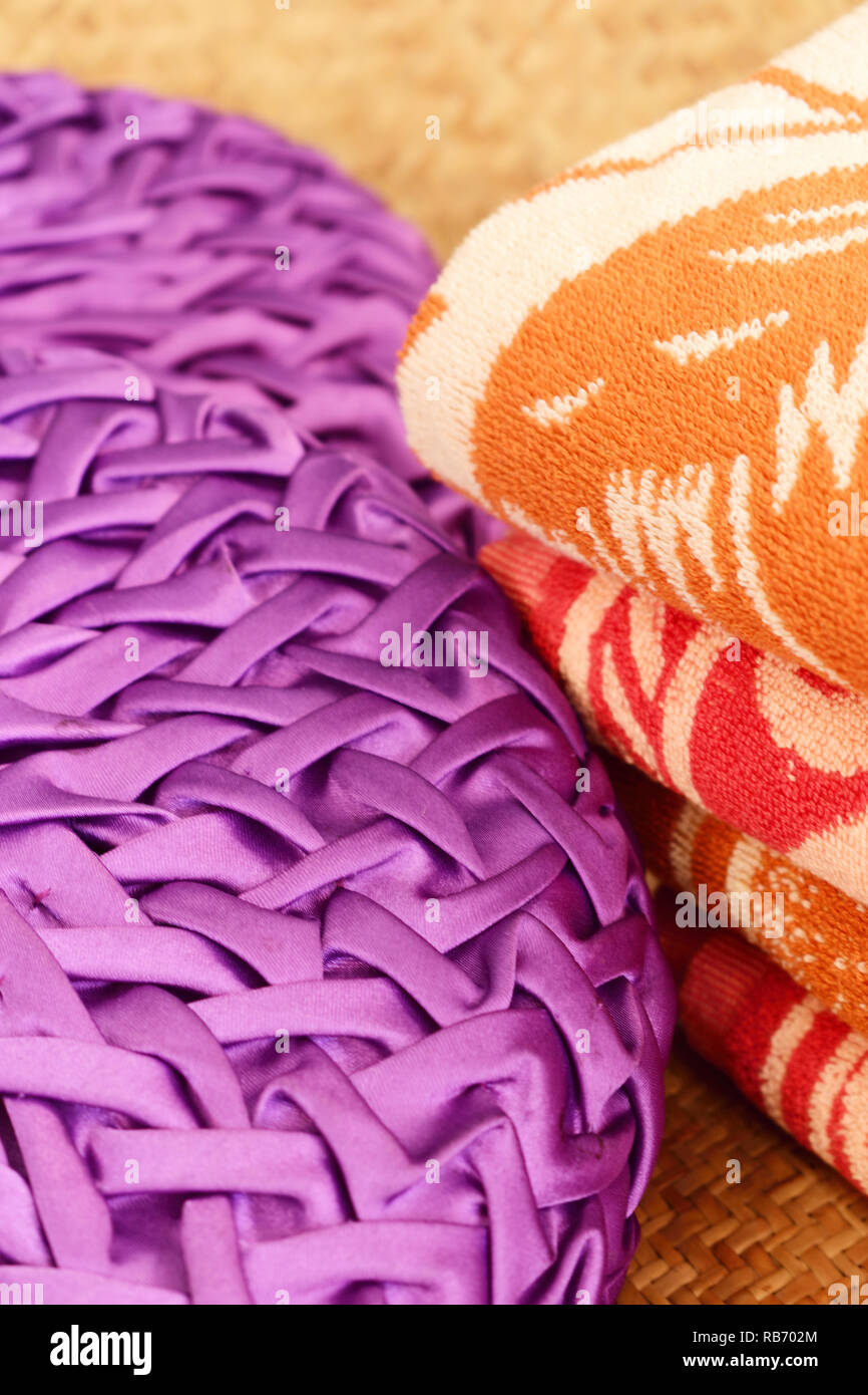 A stack of towels with a designed pillow Stock Photo - Alamy