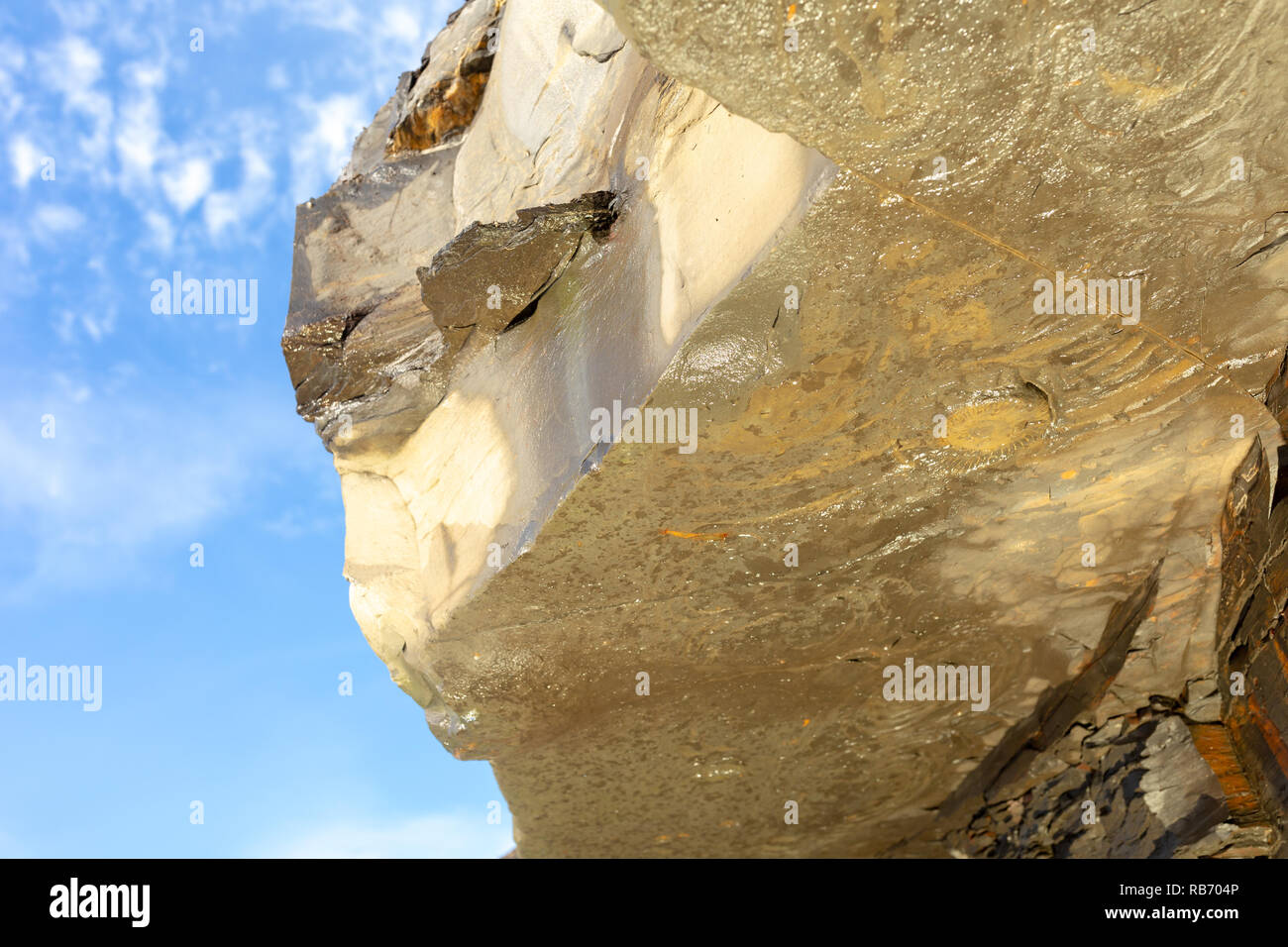 Landscape photograph taken from underneath cliff face overhang focused ...