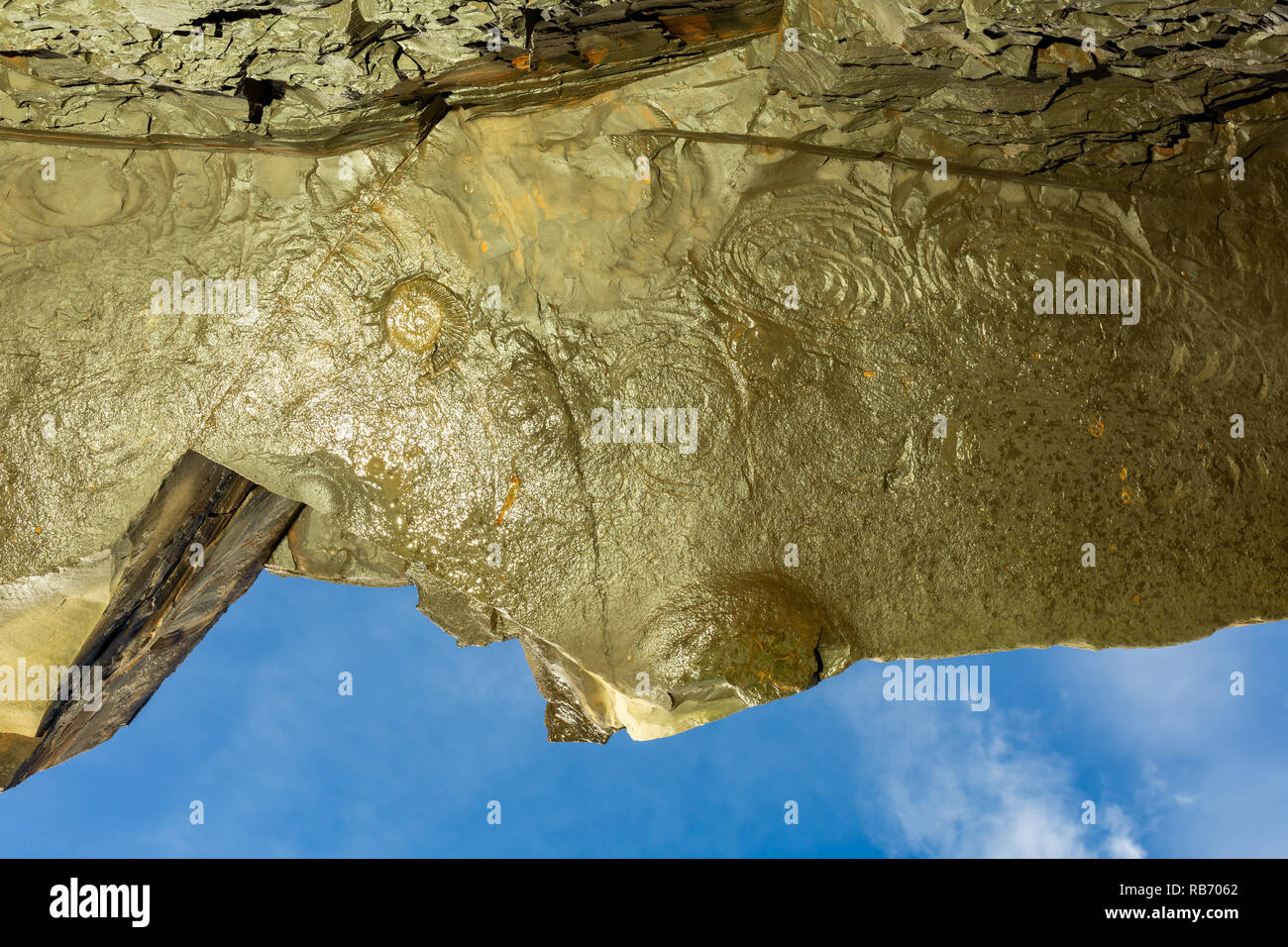 Landscape photograph taken from underneath cliff face overhang focused ...