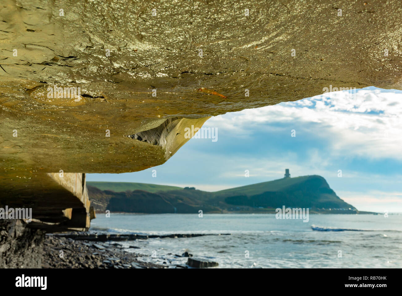 Landscape photograph taken from underneath cliff face overhang focused ...