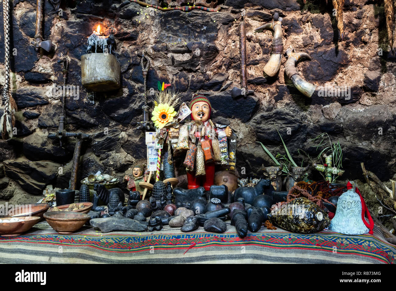 Altar to Equeko, private home, Ollantaytambo, Cusco, Peru Stock Photo ...