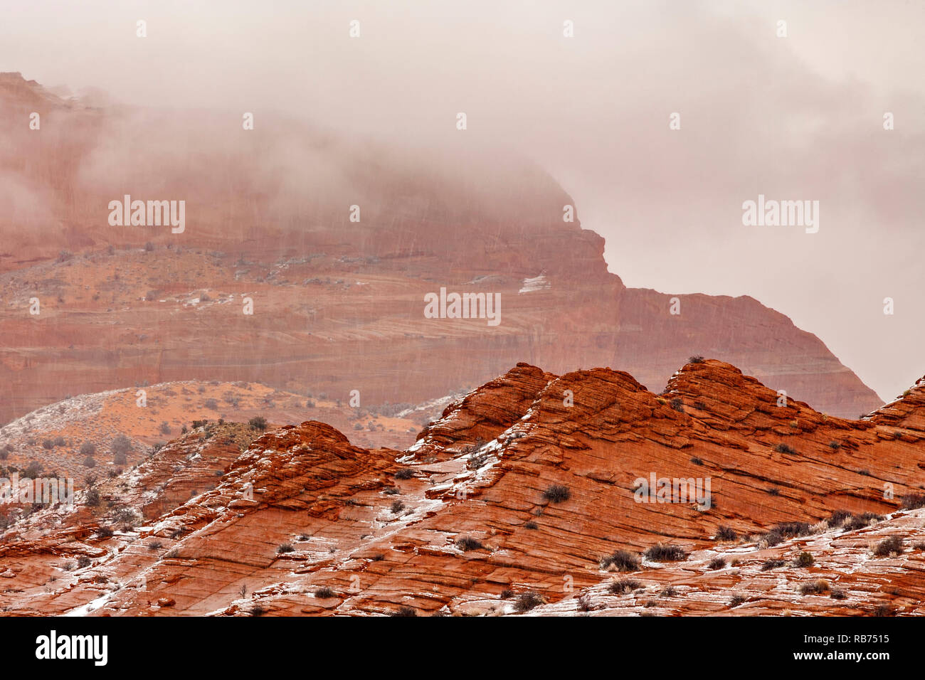 Snowing On The Buttes storm rock Stock Photo - Alamy
